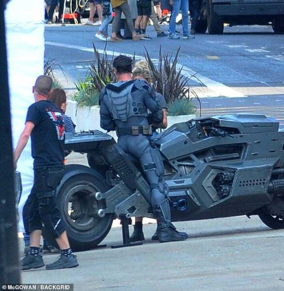 Batman body double drives motorcycle through streets for filming of The ...